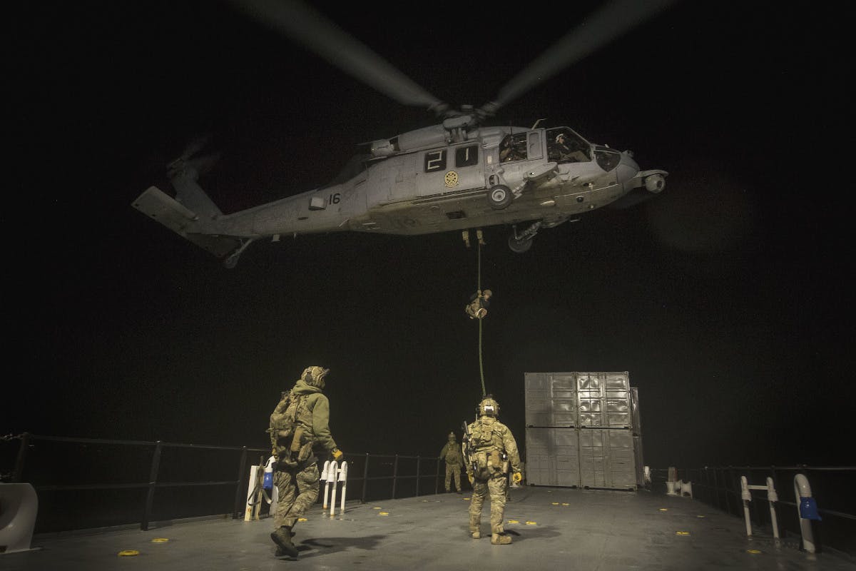 Check Out This Eerie Image Of A Navy Special Ops Seahawk Raiding A Ship ...